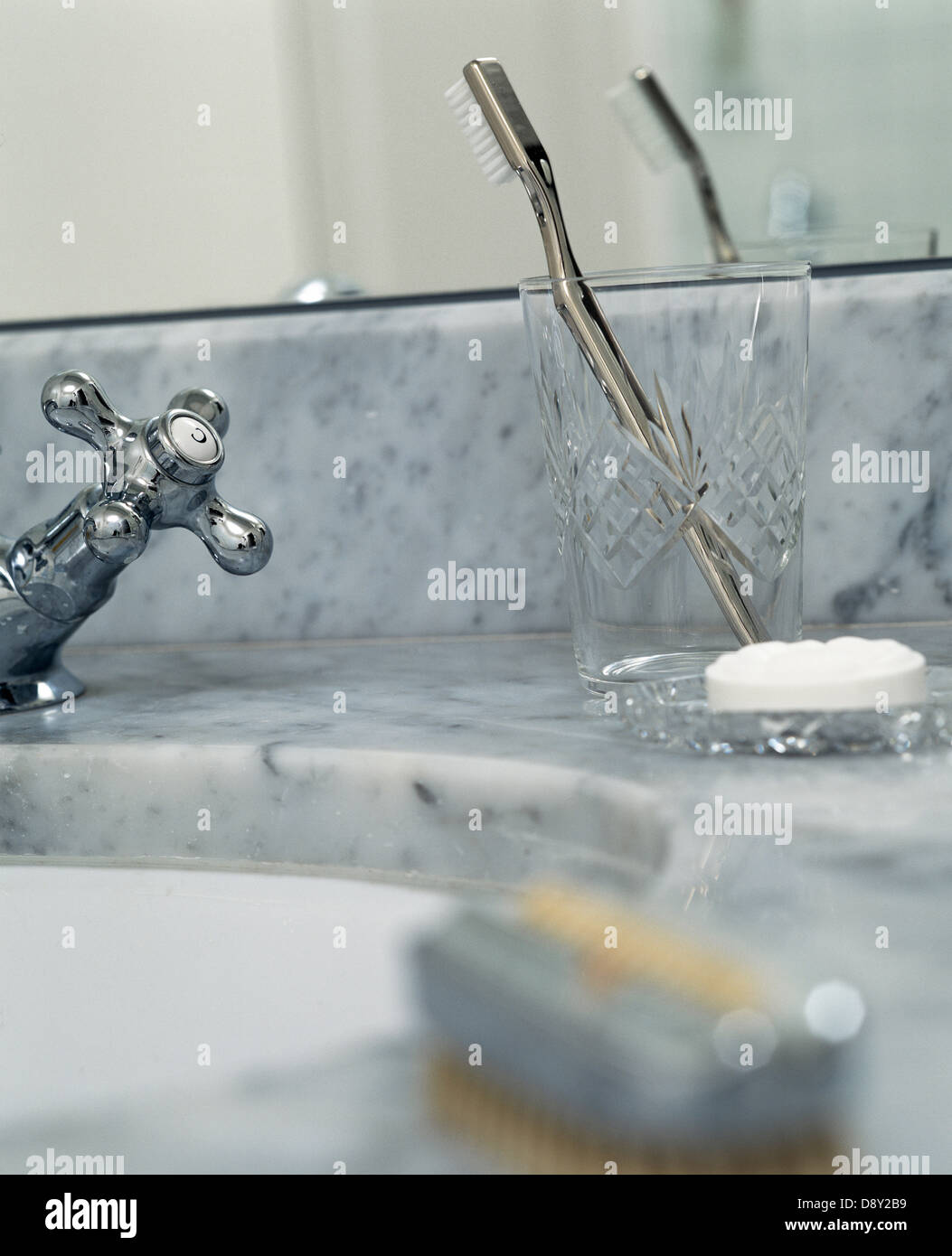 A tooth-brush in a glass Stock Photo - Alamy