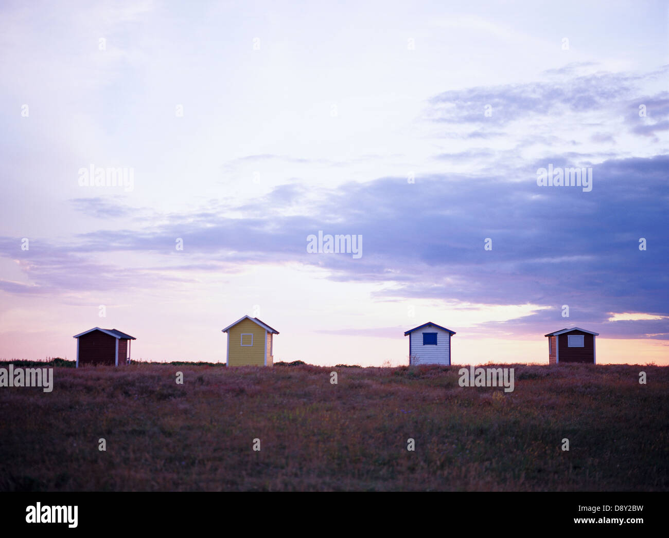 Bathing-huts in sunset Stock Photo - Alamy