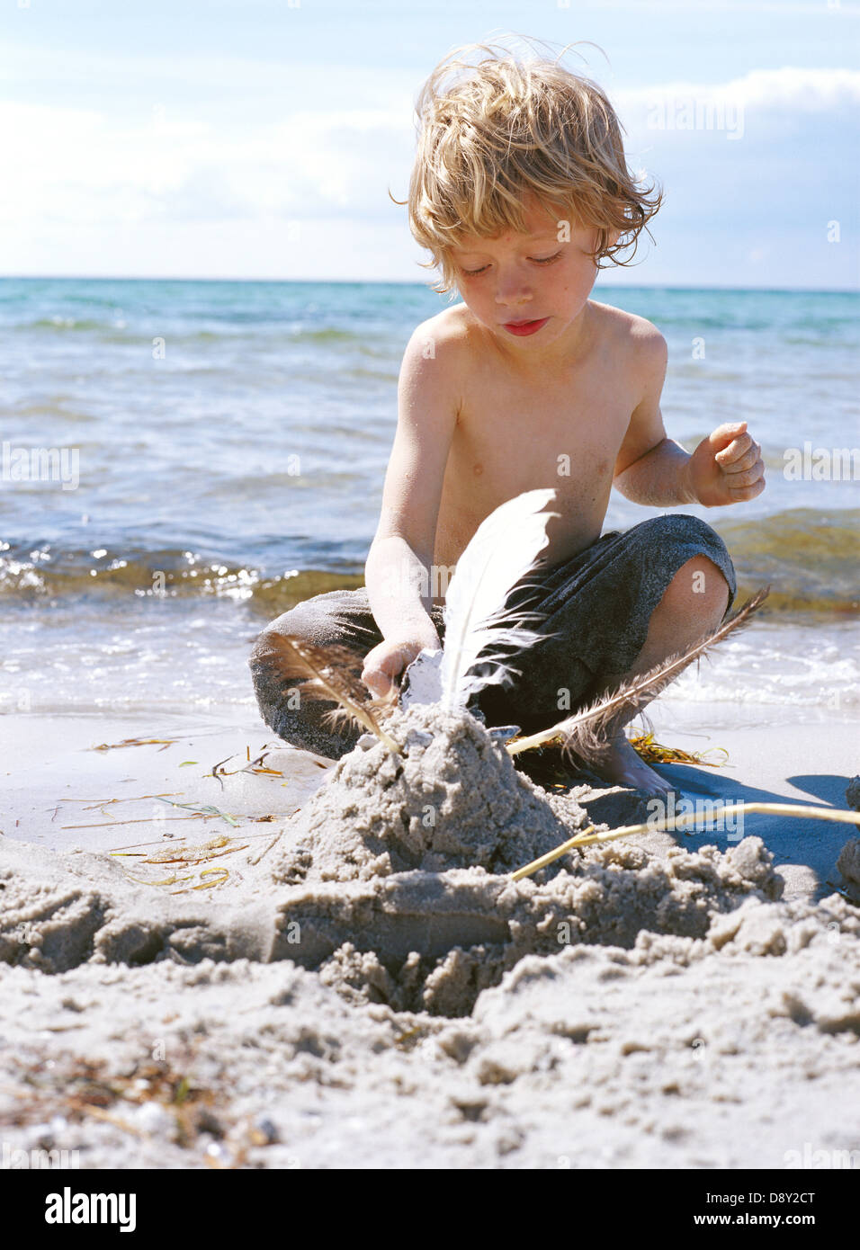 Boys building sand castle hi-res stock photography and images - Alamy