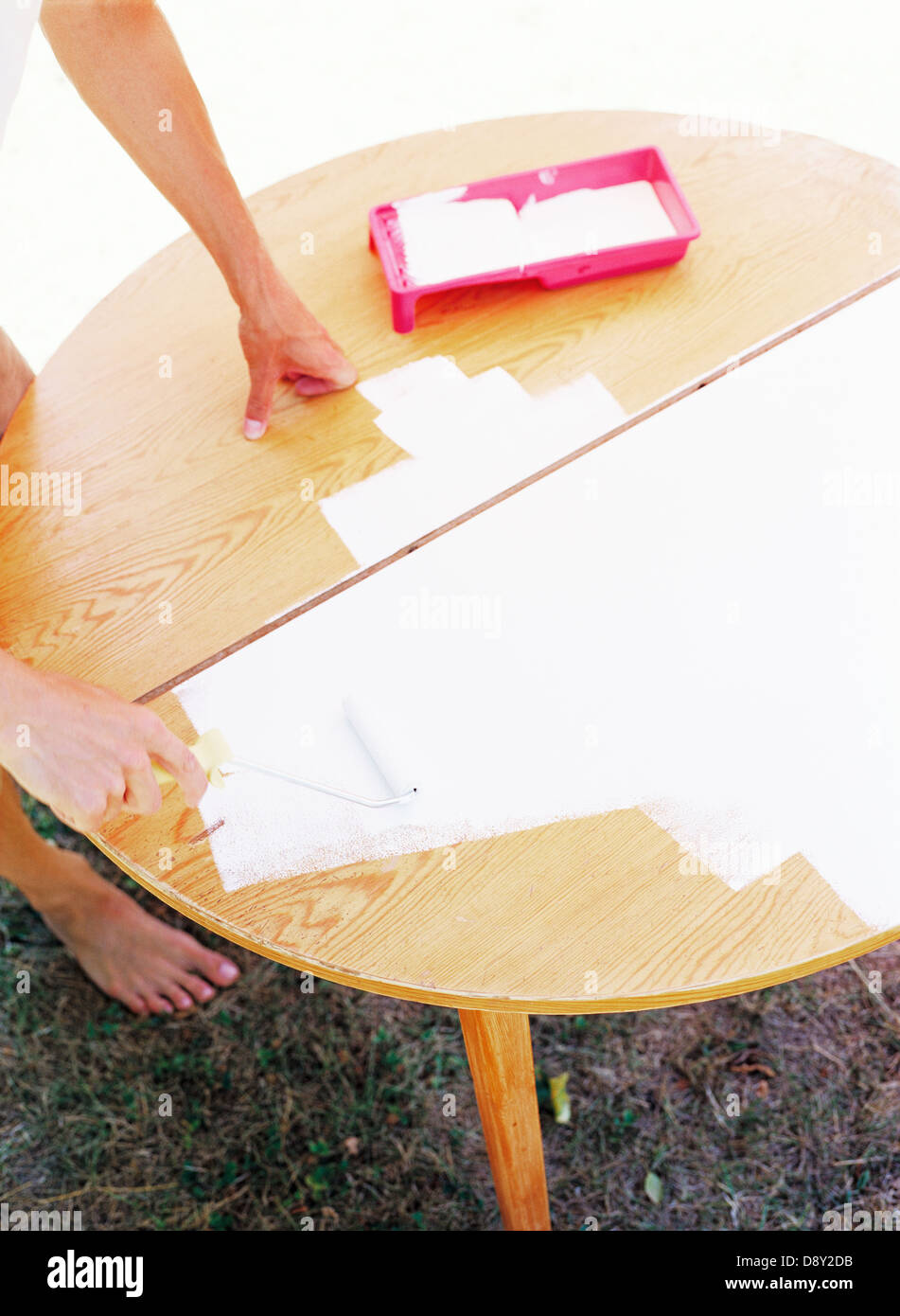 Painting a table Stock Photo - Alamy