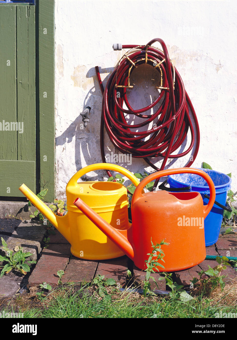 Colourful water hoses Stock Photo - Alamy