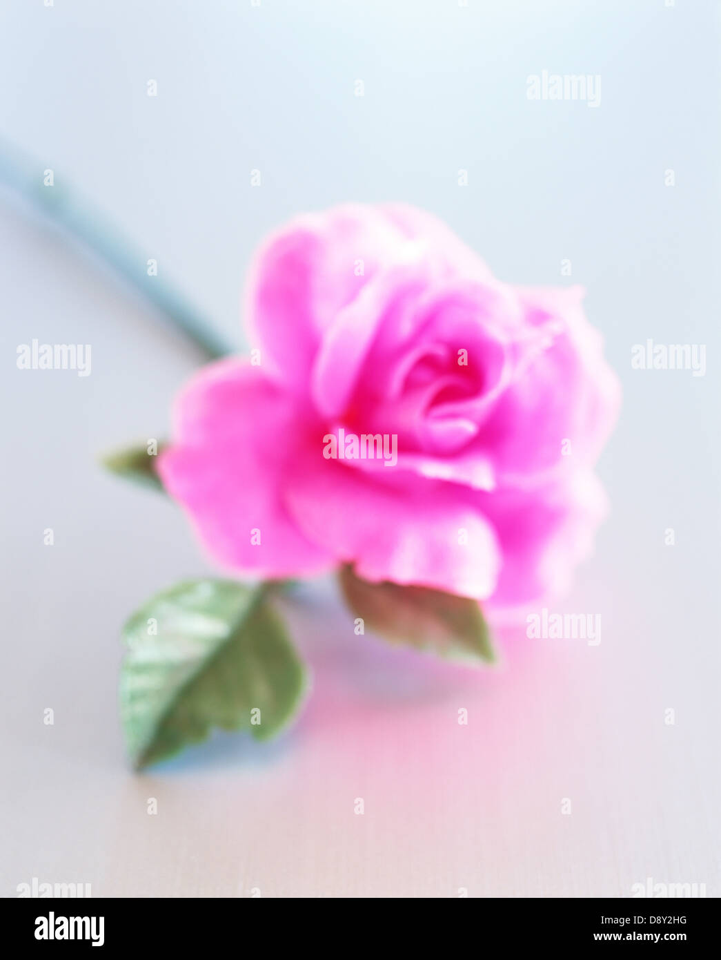 A pink plastic rose Stock Photo - Alamy