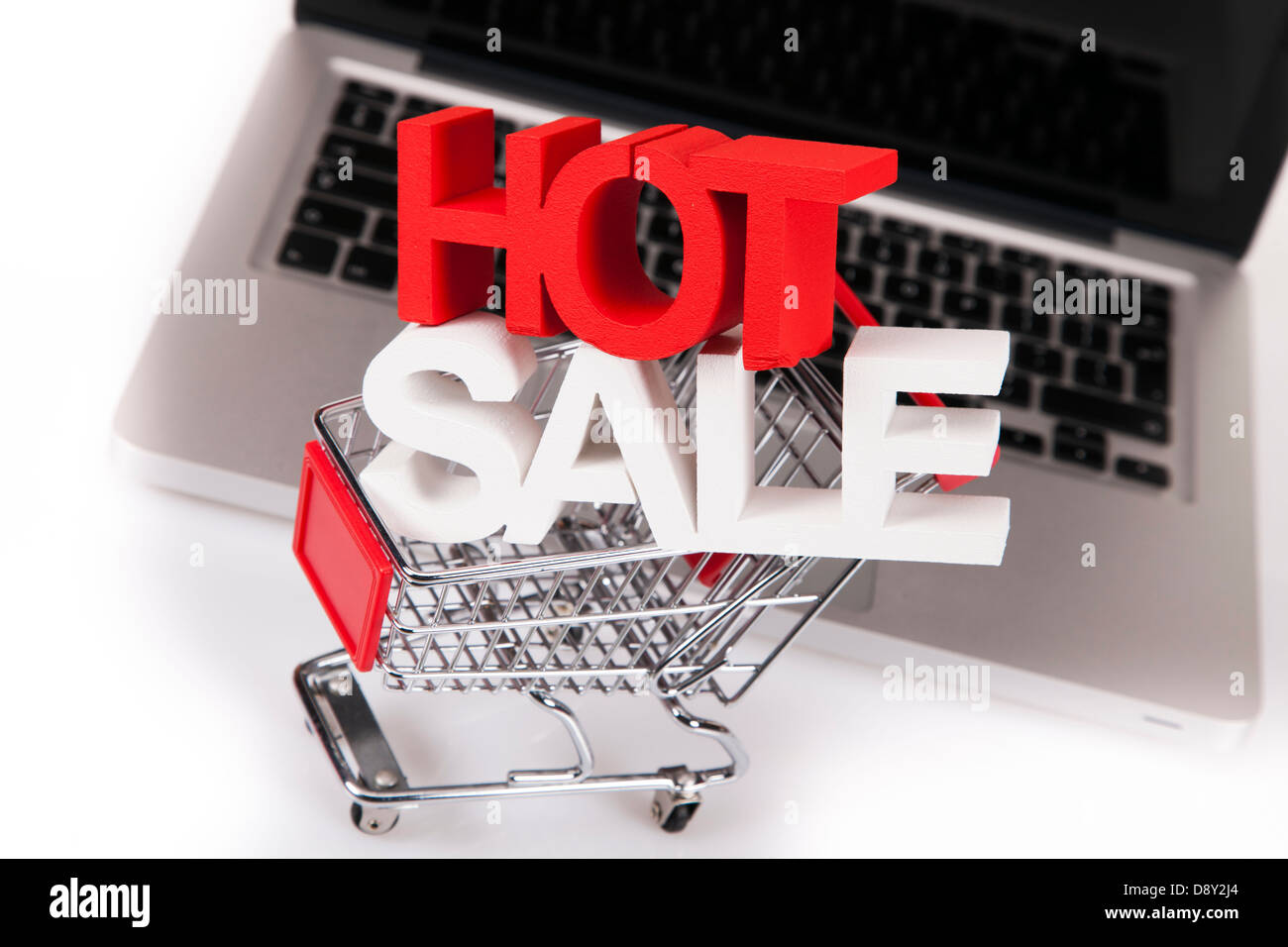 Computer, basket and free web shoping Stock Photo - Alamy