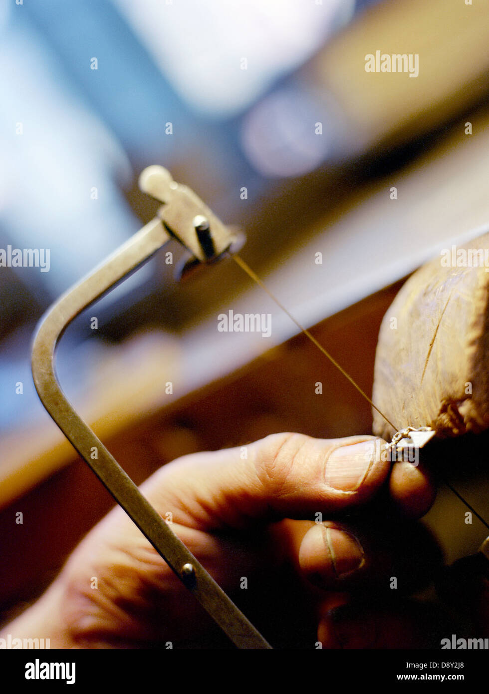 Goldsmith working with saw hi-res stock photography and images - Alamy