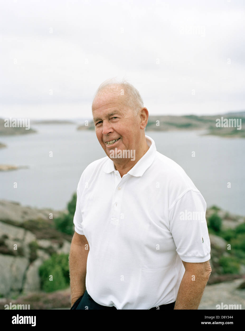 A man standing by the sea, portrait Stock Photo - Alamy