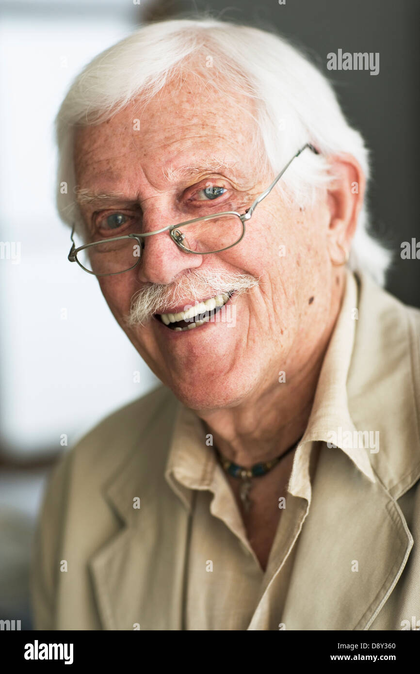 An old man with moustache and glasses Stock Photo - Alamy