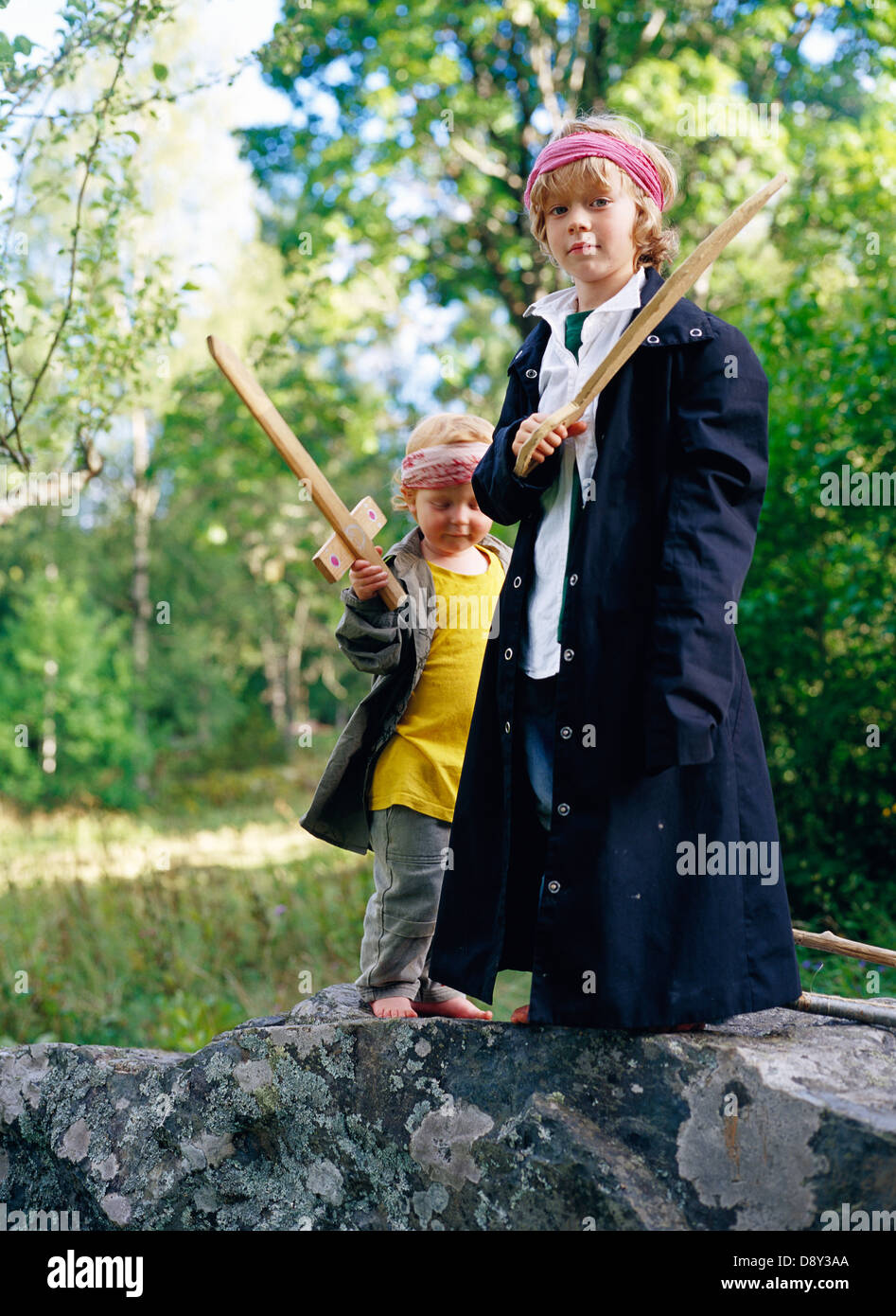 Two boys playing pirates Stock Photo - Alamy