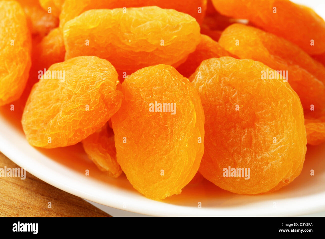 Bowl of dried apricots - detail Stock Photo - Alamy