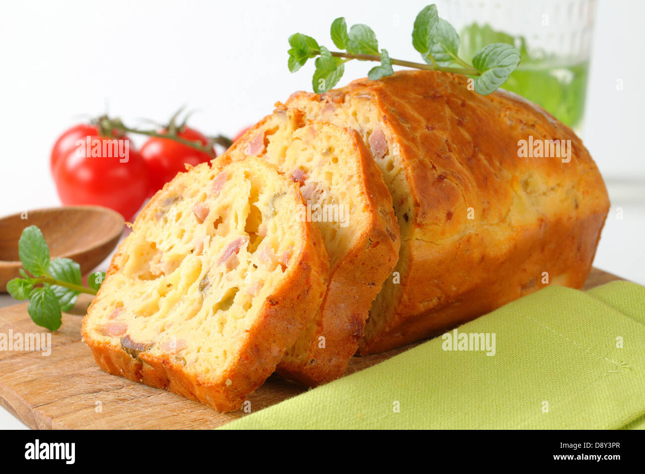 Slices of savory ham and olive cake Stock Photo - Alamy