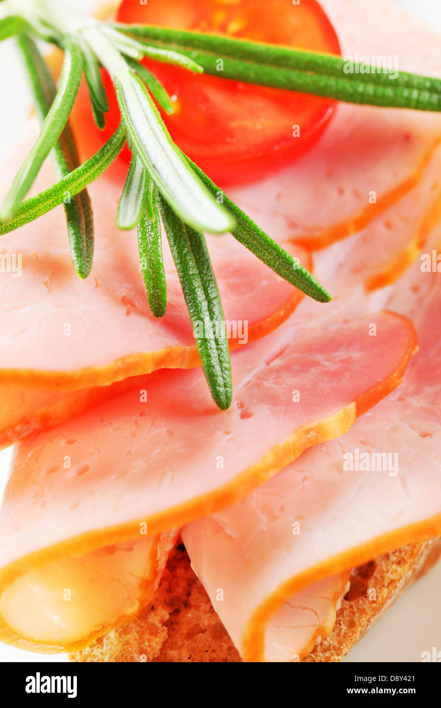 Bread with thinly sliced ham Stock Photo - Alamy