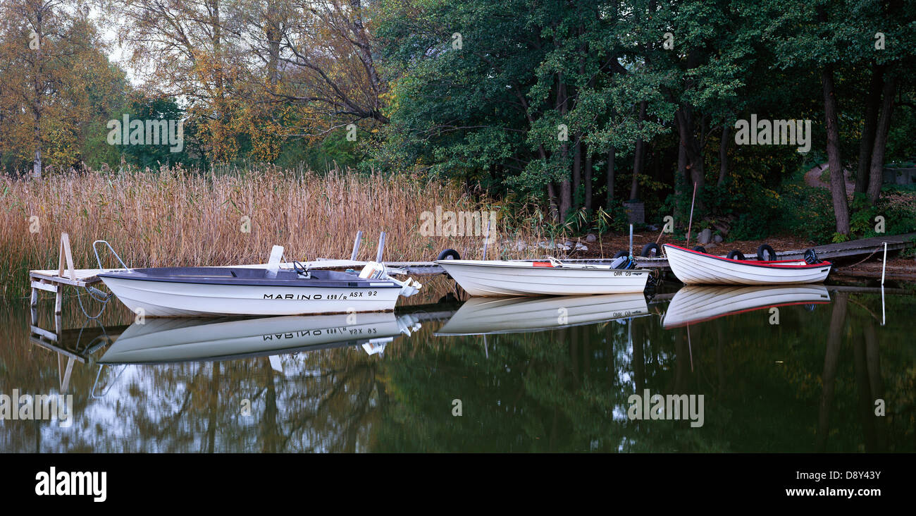 Boats at a jetty Stock Photo - Alamy