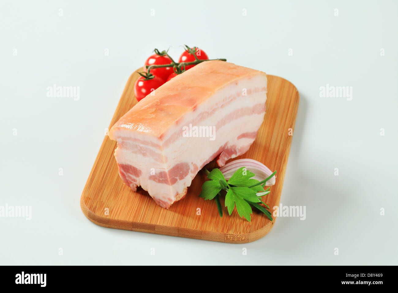 Slab of pork belly with rind Stock Photo - Alamy