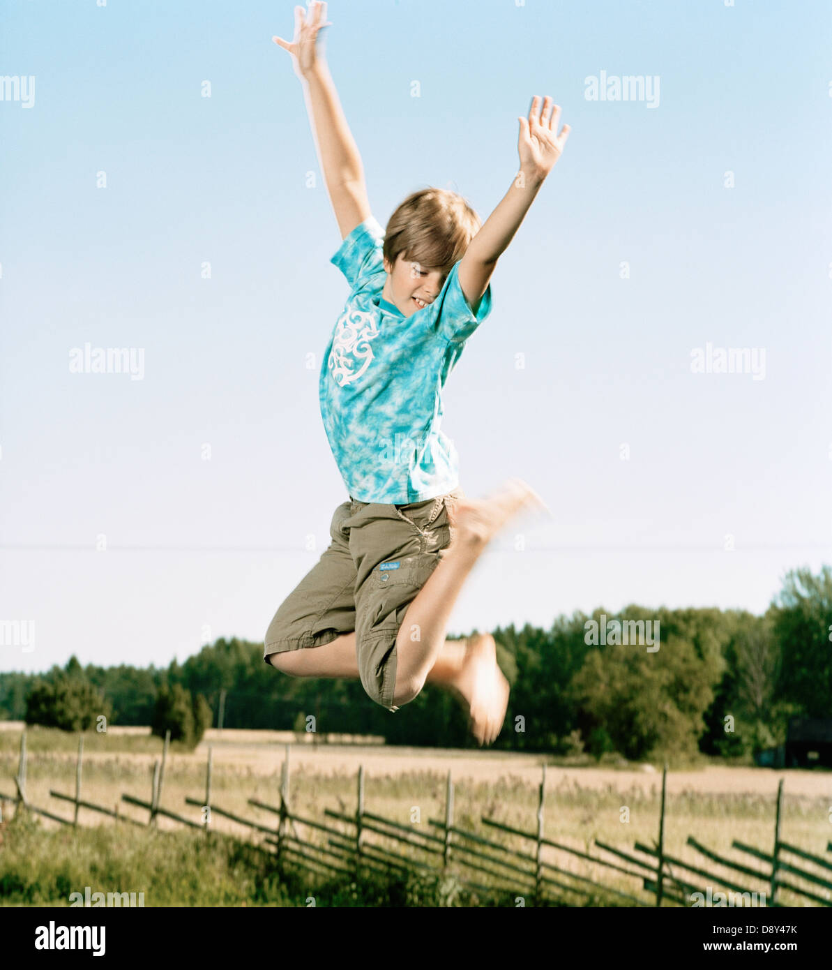 A boy jumping high Stock Photo - Alamy