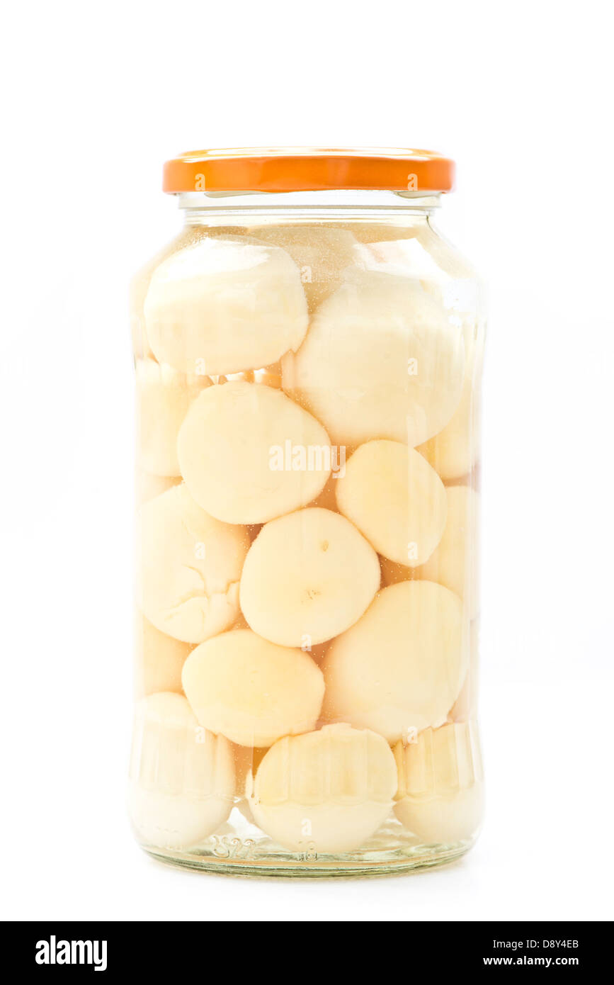Potatoes in glass jar on a white background Stock Photo - Alamy