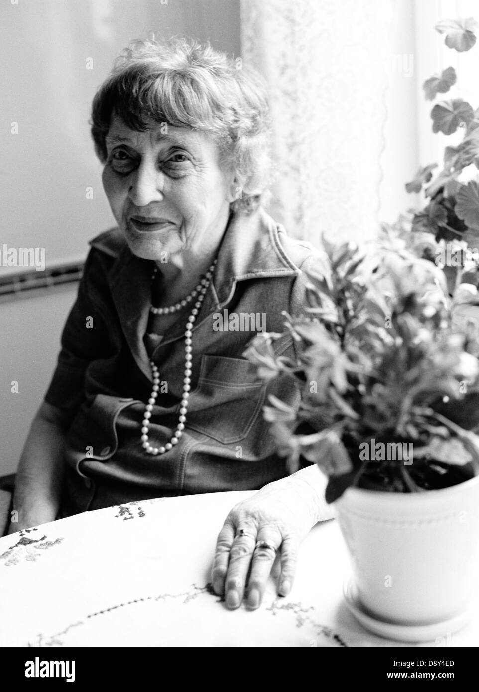 Positive smiling person sitting Black and White Stock Photos & Images ...