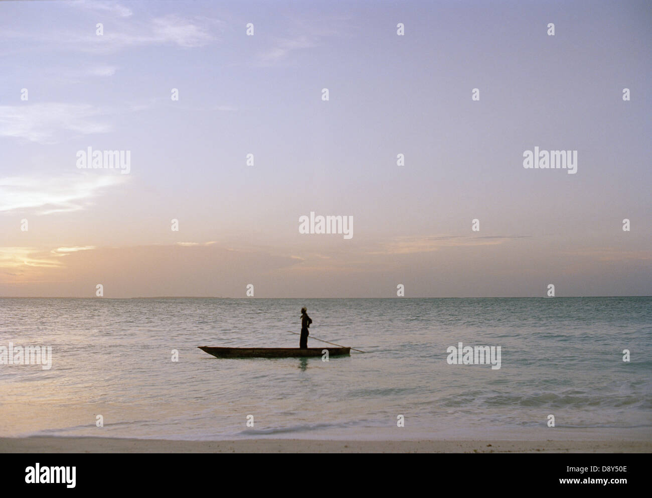 A boat in the sunset Stock Photo - Alamy