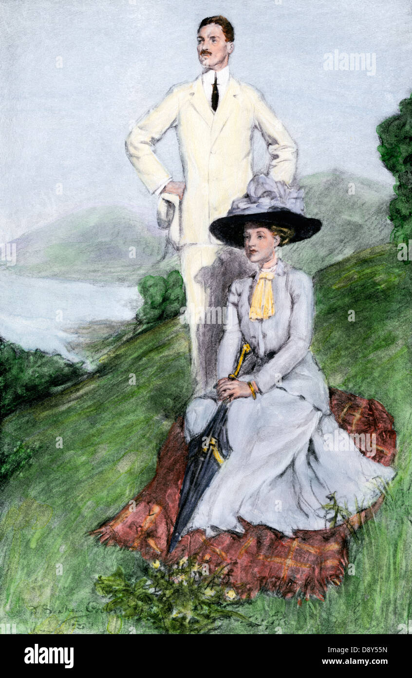 Well-to-do couple on a hillside, early 1900s. Hand-colored halftone of ...