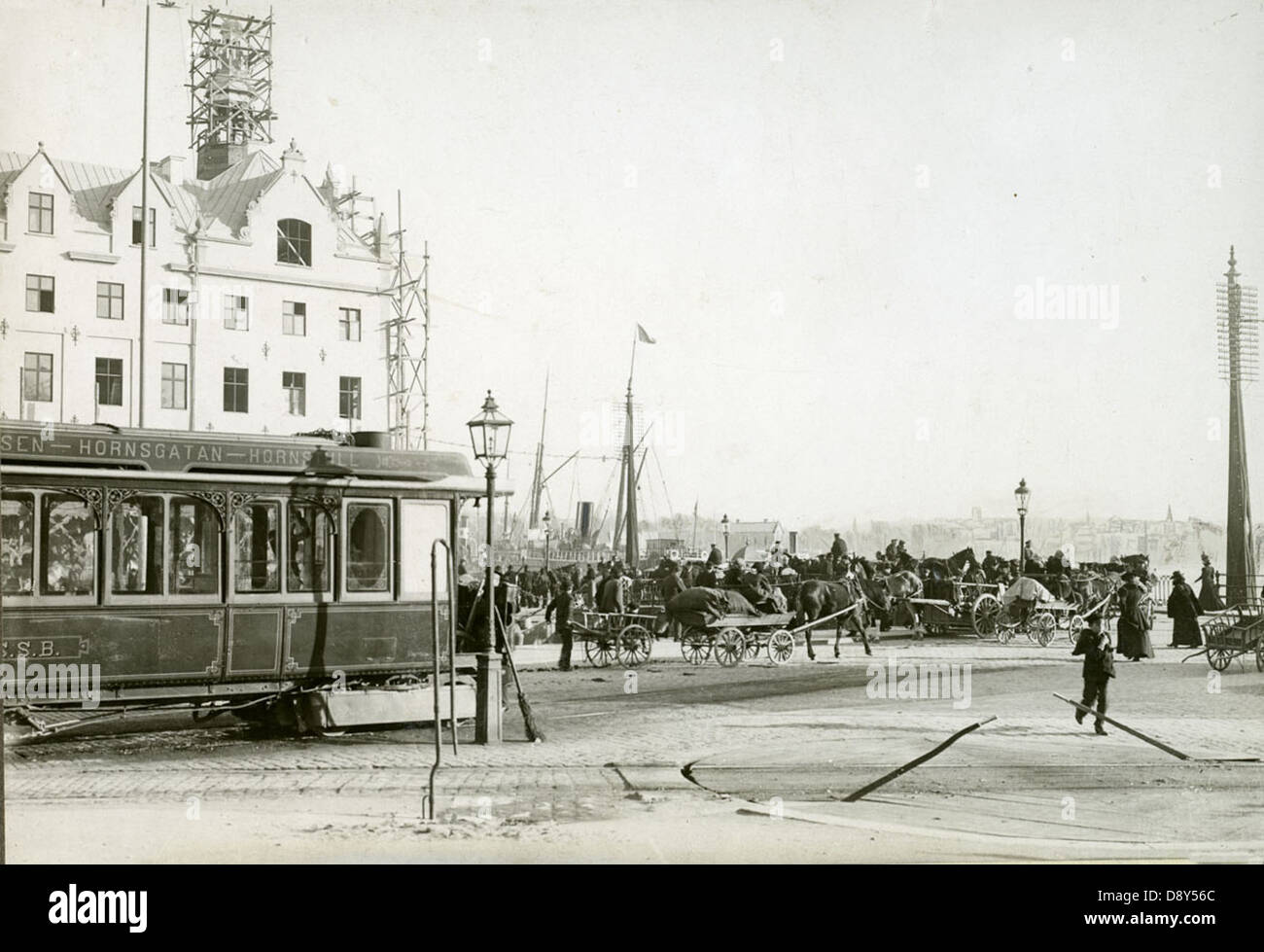 This 1888 photograph shows a steam tram in Stockholm, showcasing an ...