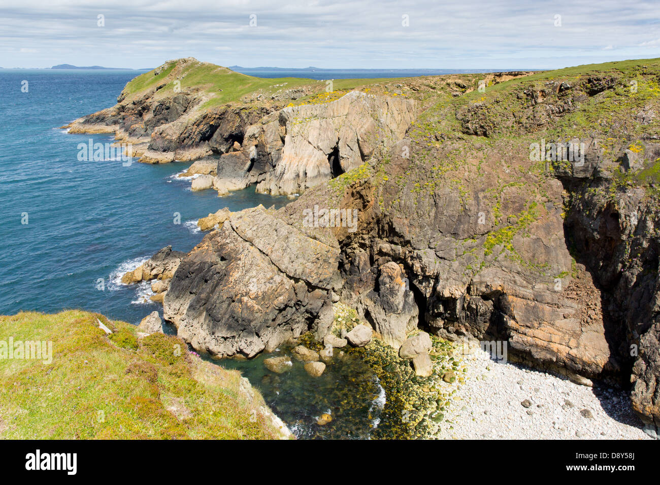 Wooltack Point hill overlooking Skomer Island Pembrokeshire West Wales ...