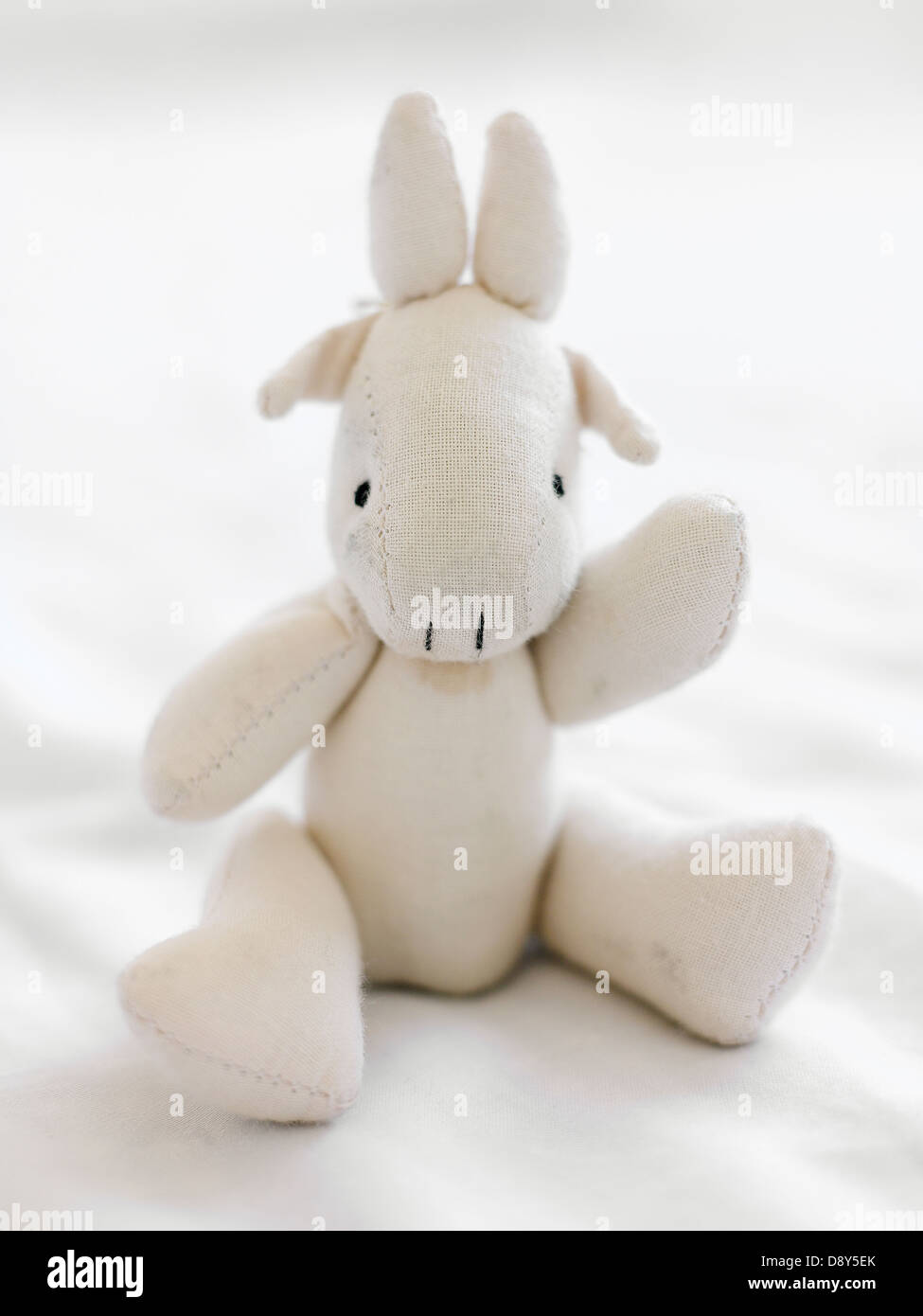 A white toy rabbit Stock Photo - Alamy