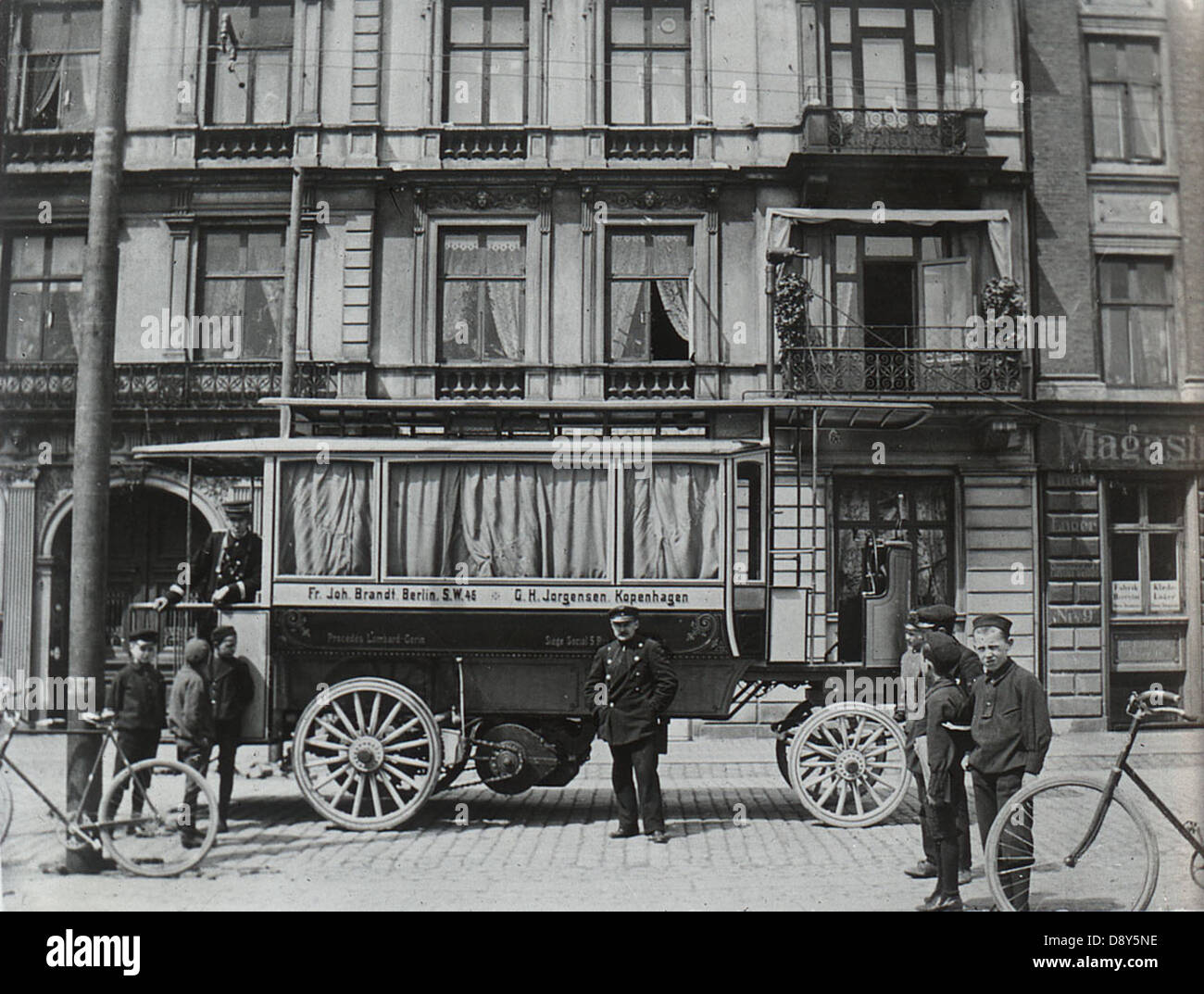 This historical photograph shows a trolley bus in Copenhagen, Denmark ...