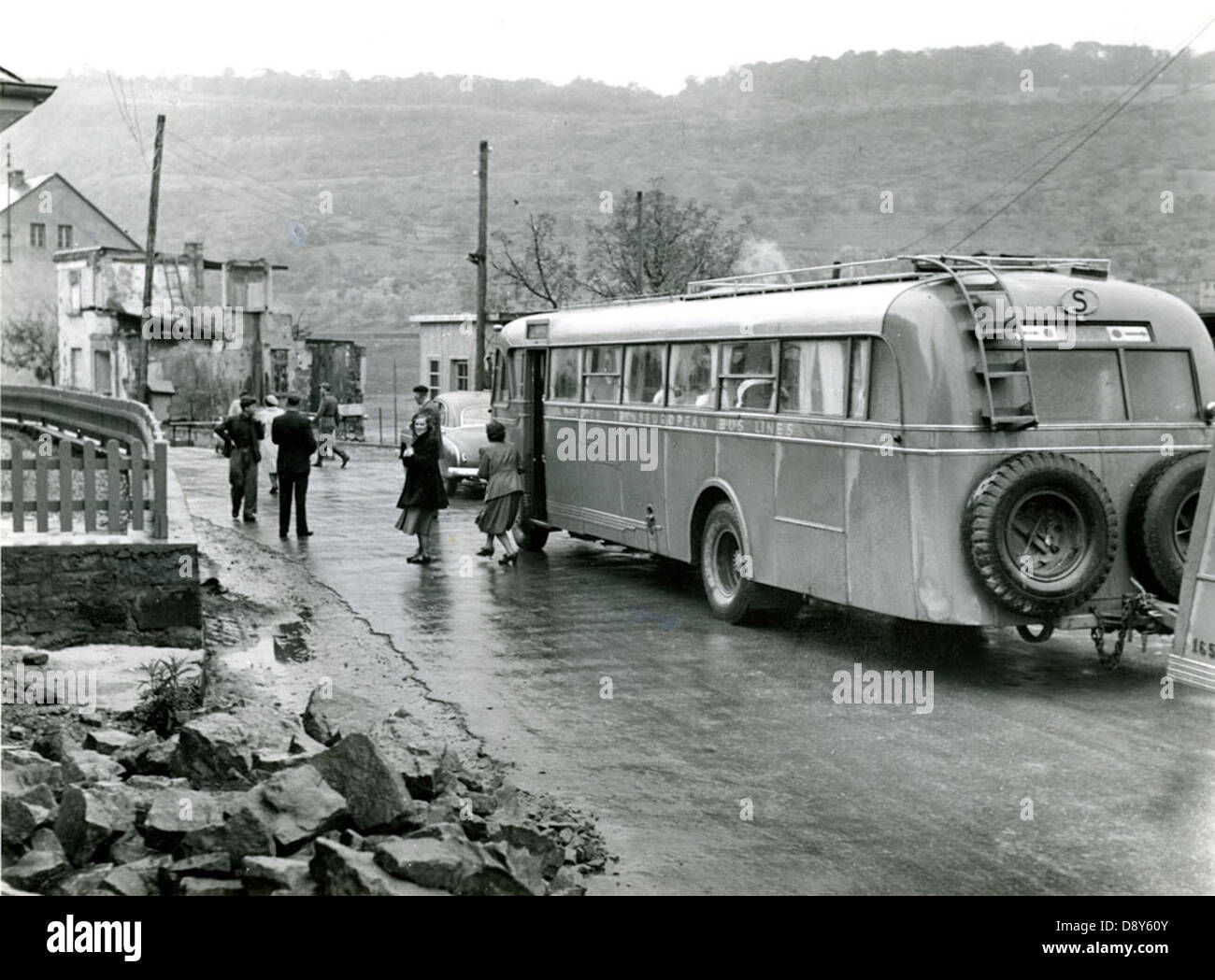 This 1948 photograph shows a bus at the border between Luxembourg and ...