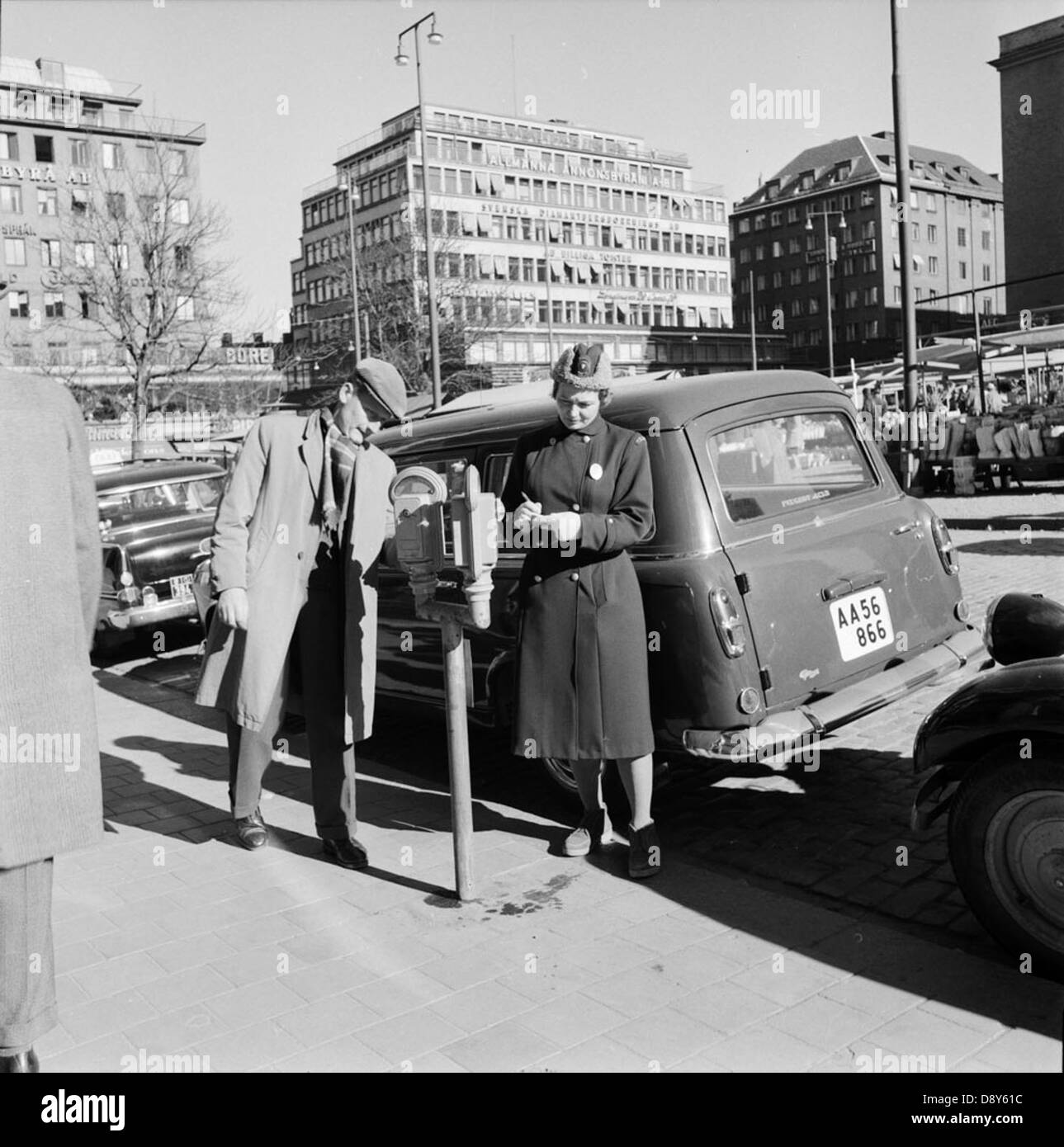 This 1961 photo shows a ‘meter maid’ in Stockholm, a woman employed to ...