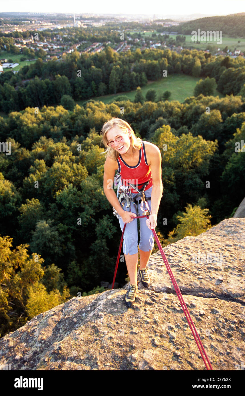 A woman mountain climbing Stock Photo - Alamy