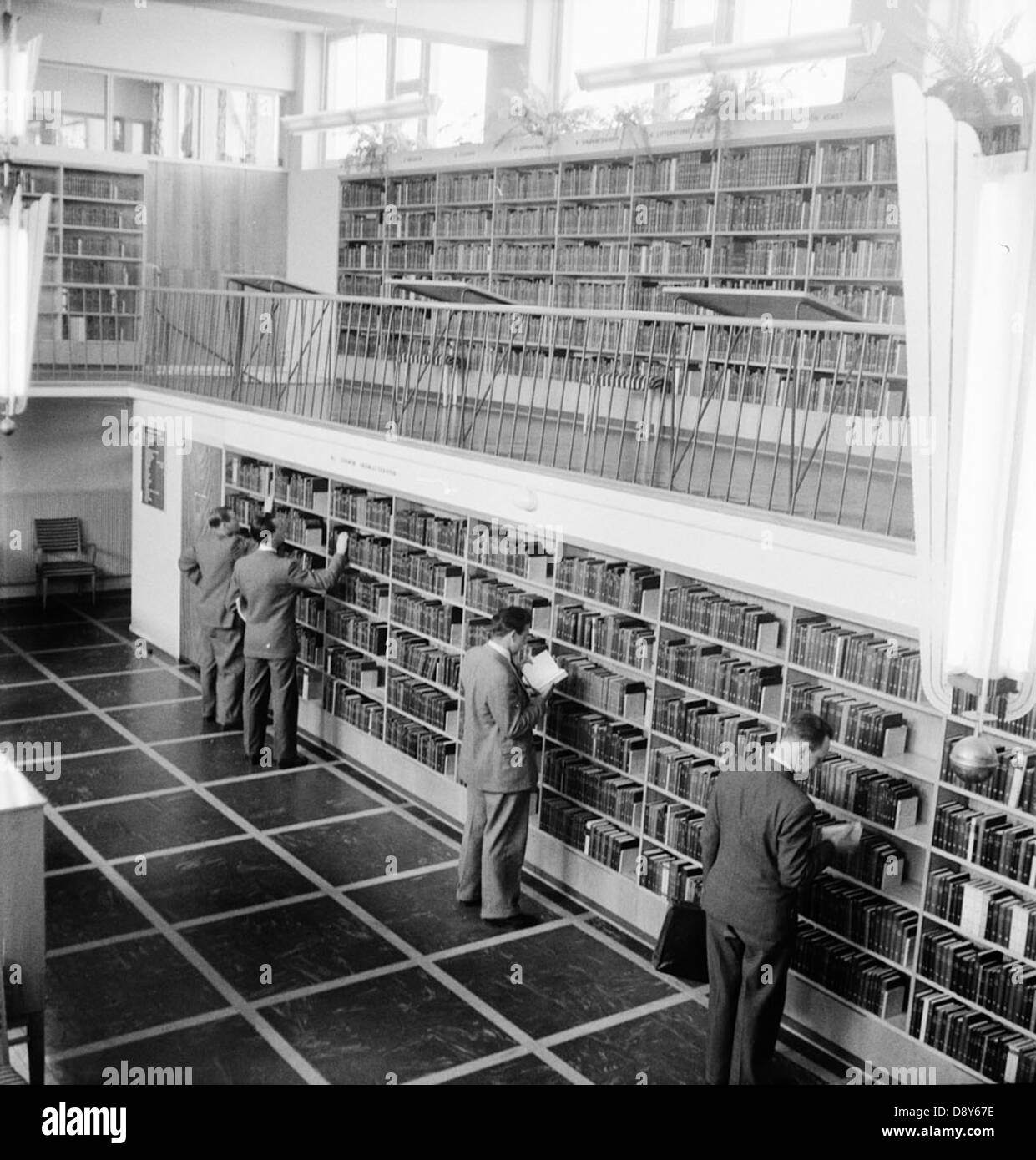Men at a public library in Malmö 1949 Stock Photo - Alamy