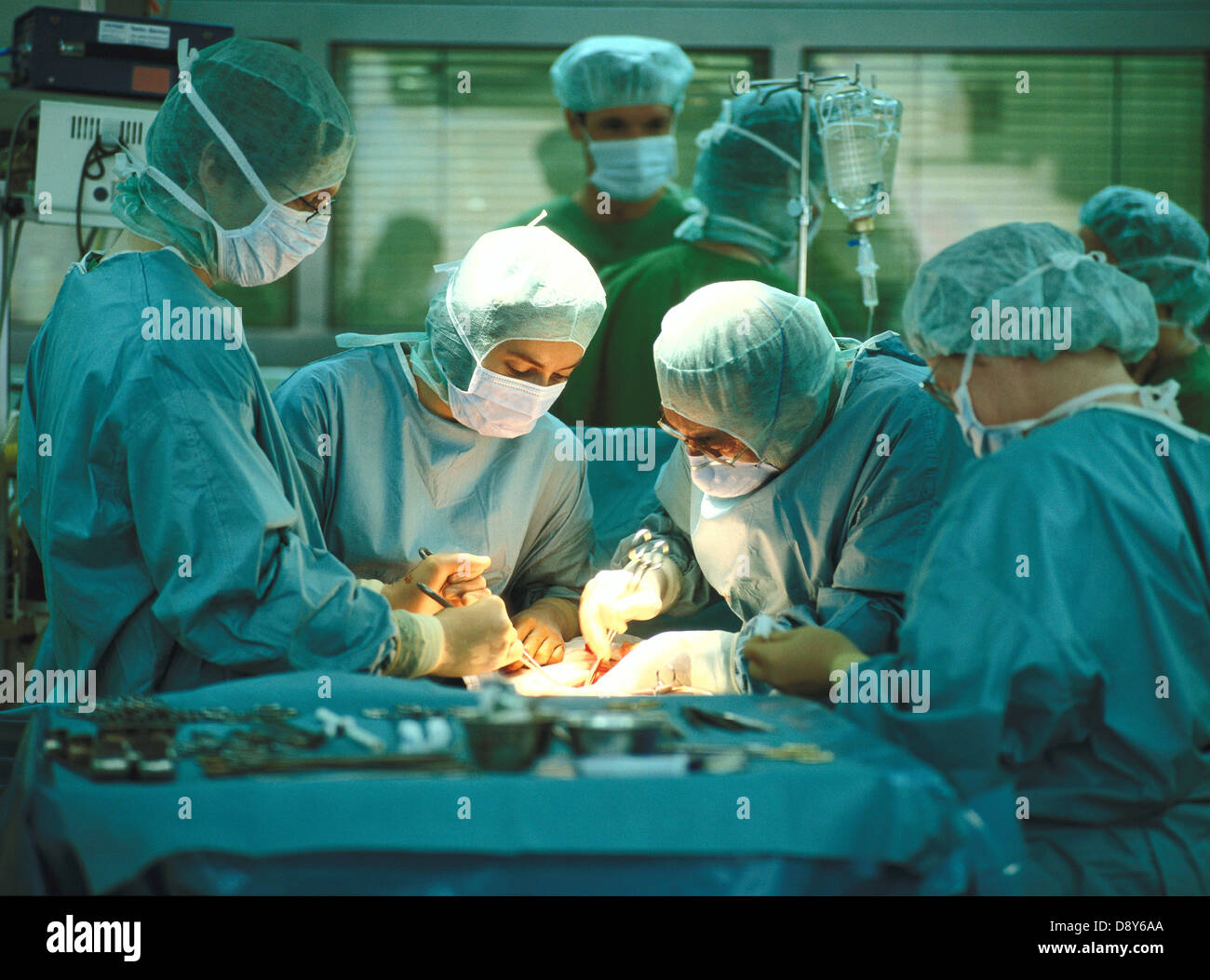 Team doctors performing heart operation Stock Photo - Alamy