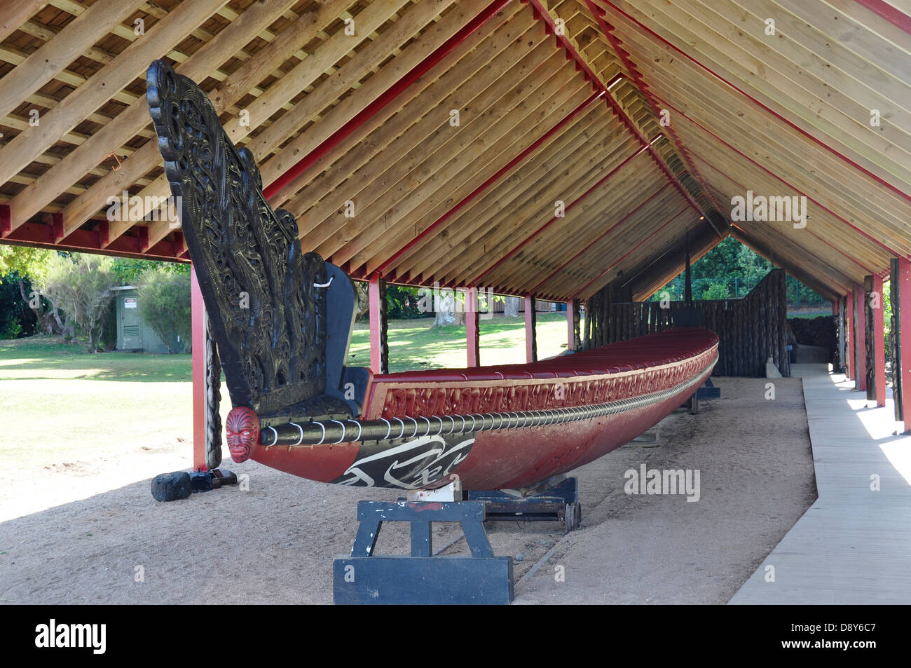 Maori cultural boat art canoe hut with boat new zealand Stock Photo - Alamy