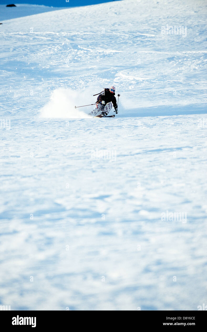 Woman goes off piste Stock Photo - Alamy