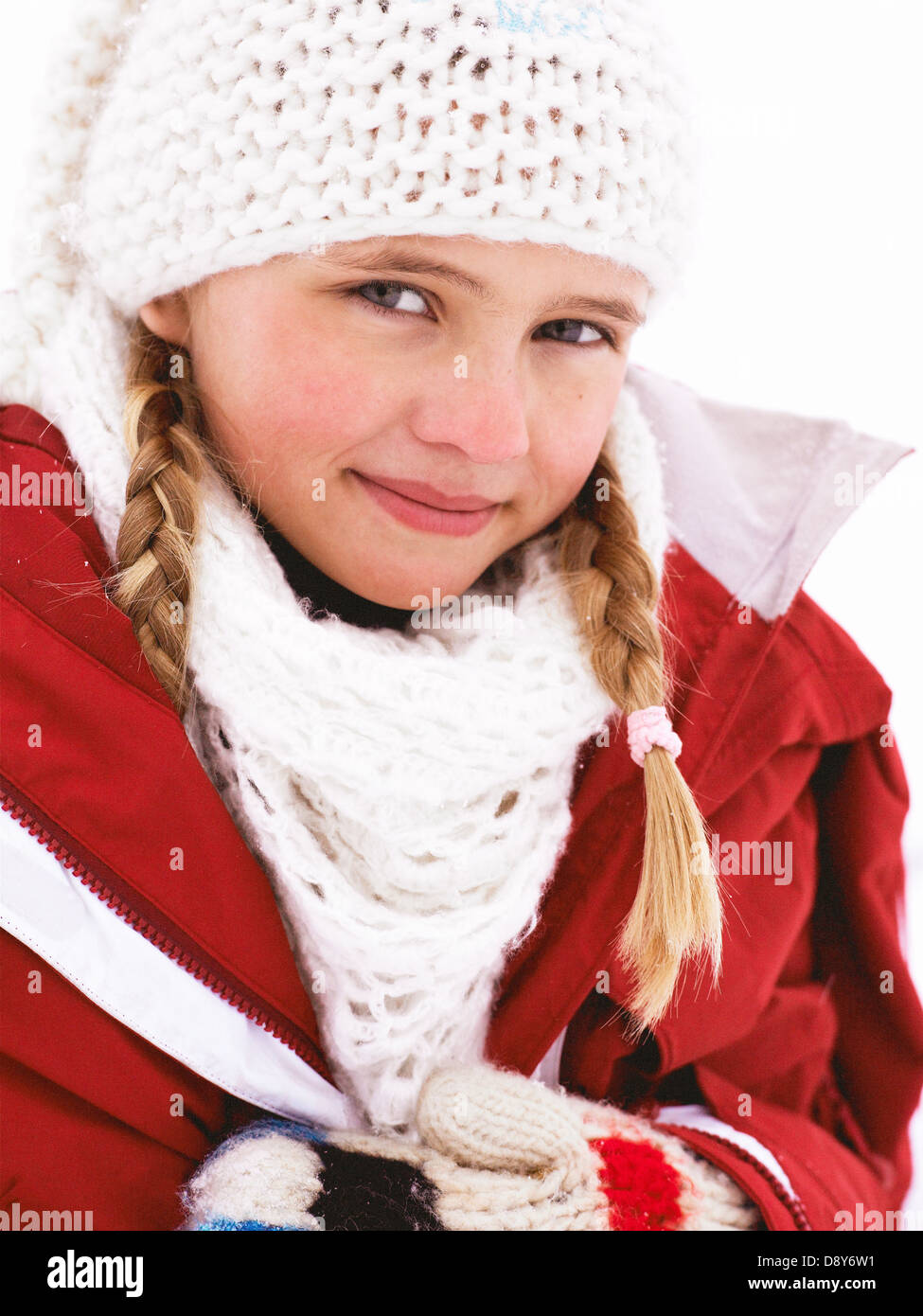 A girl dressed in winter clothes, portrait Stock Photo - Alamy