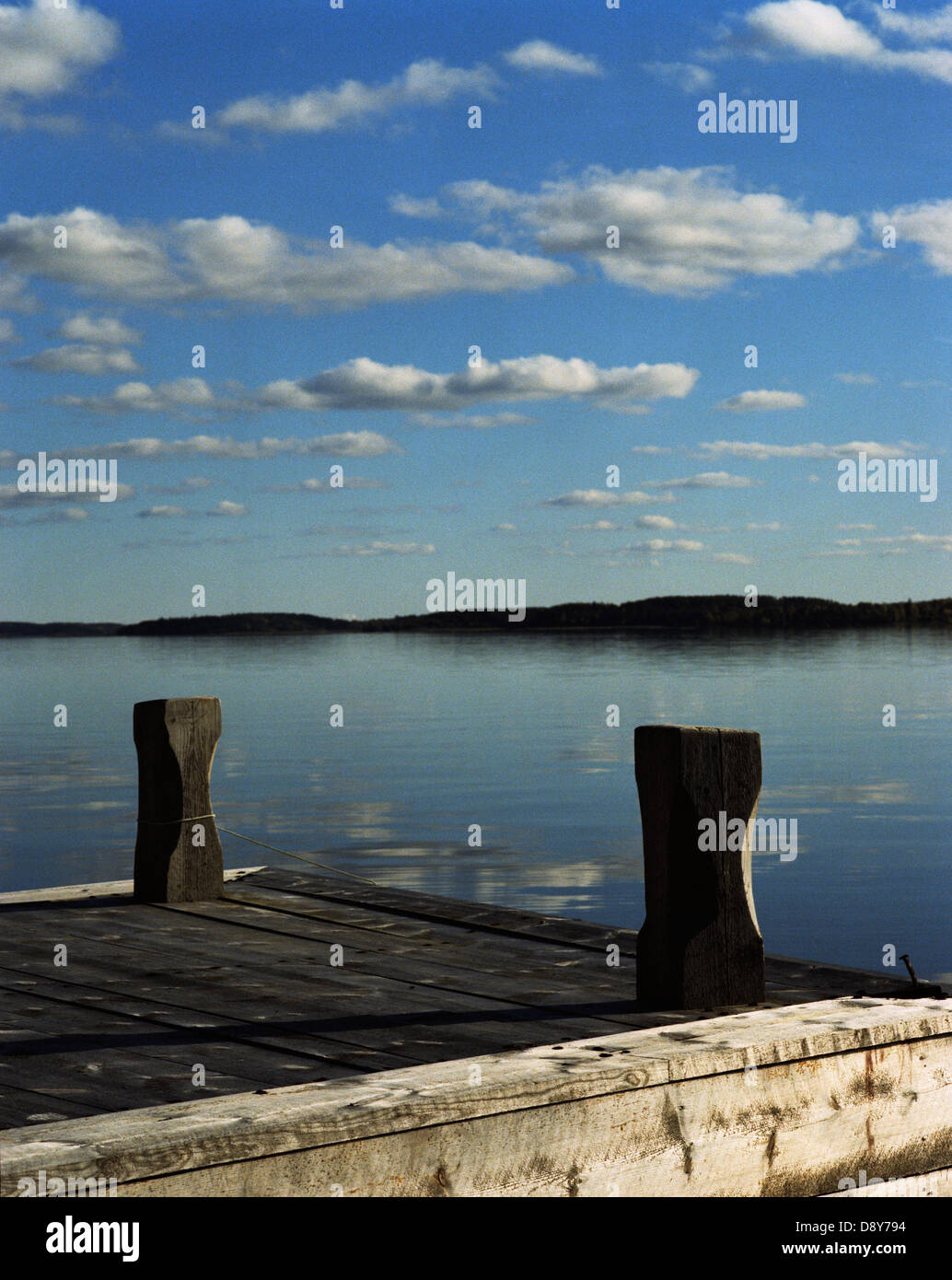 A jetty with bitts, Braviken, Sweden Stock Photo - Alamy