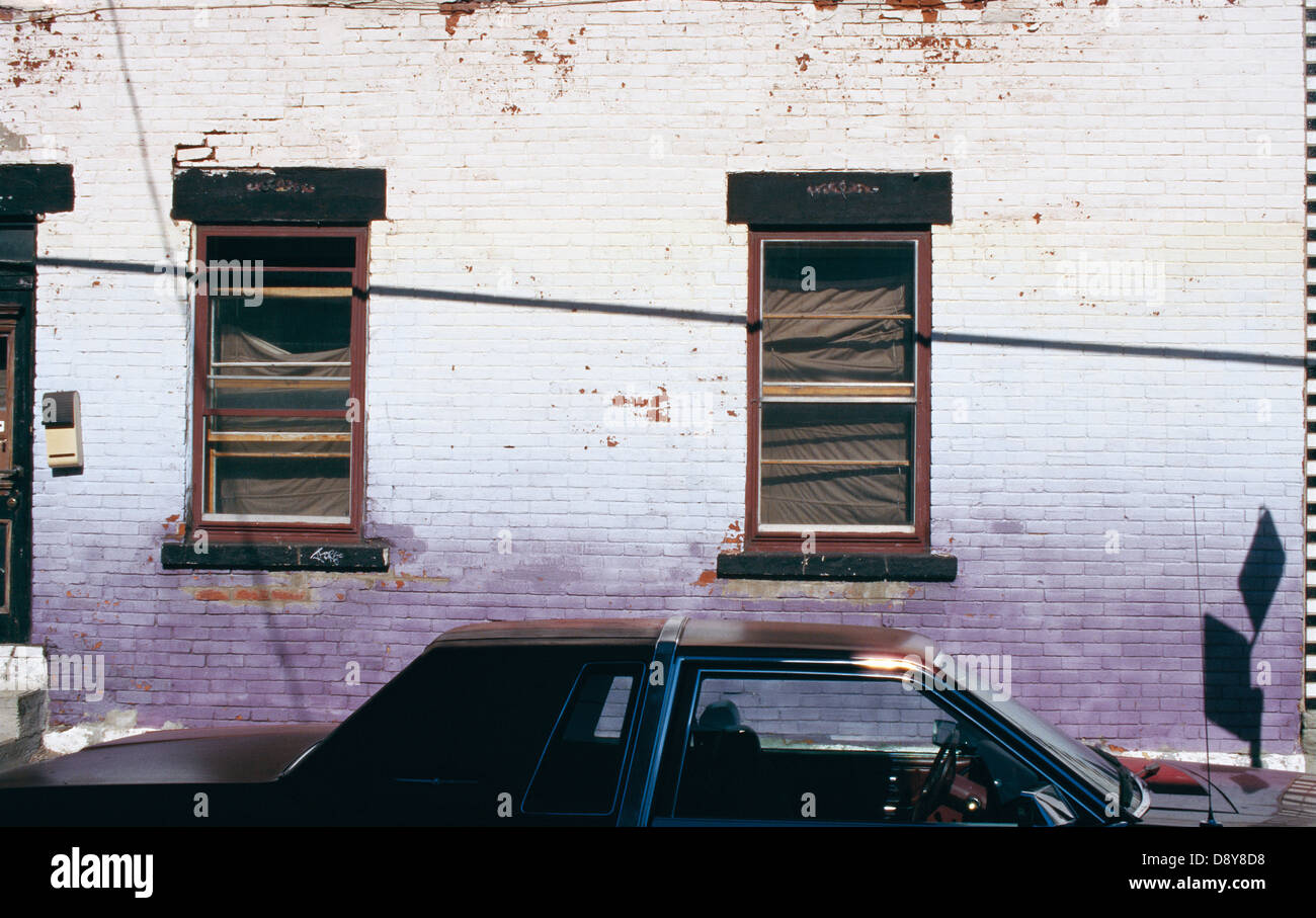 Car parked in front of a building Stock Photo - Alamy