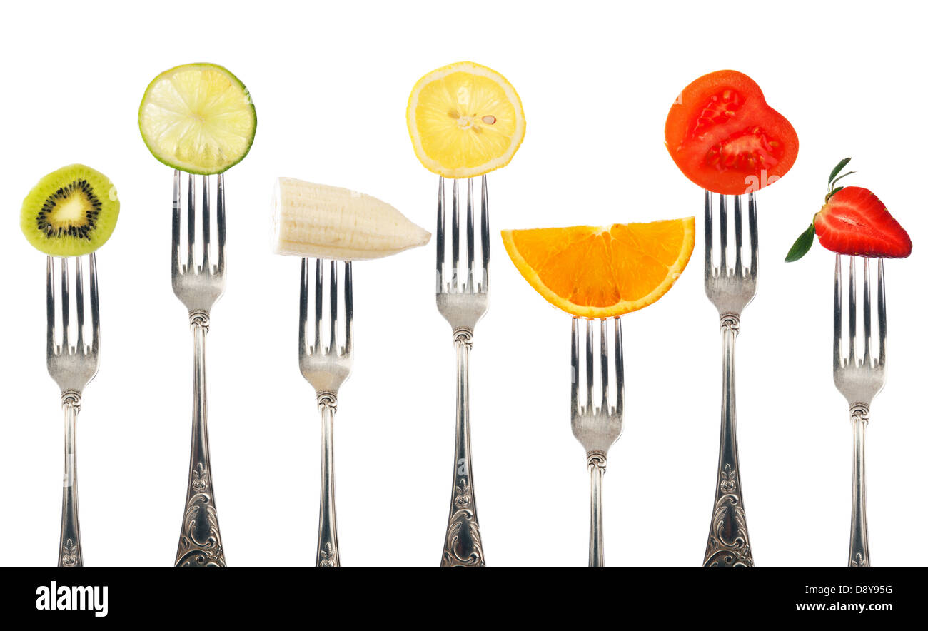 Fruit on forks Stock Photo - Alamy