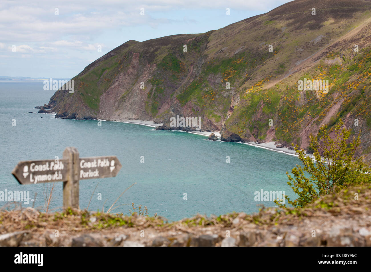 Coastal landscape, sign and view of coast. Exmoor National Park, UK ...