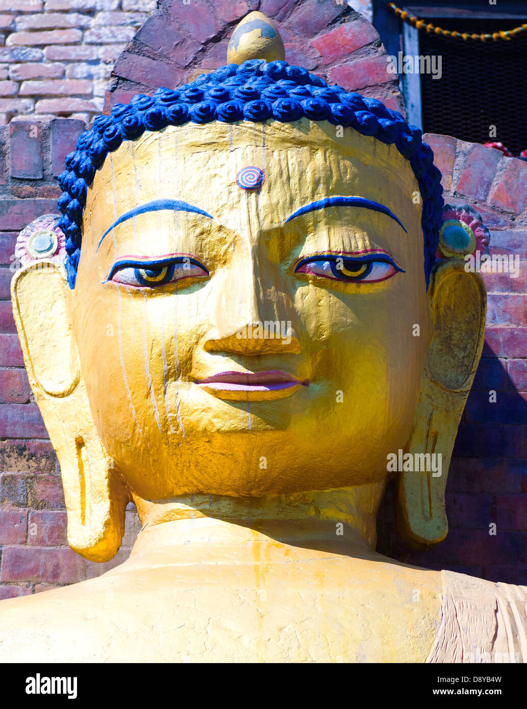 Beautiful golden buddha head statue at theswayambunath monkey temple hi ...