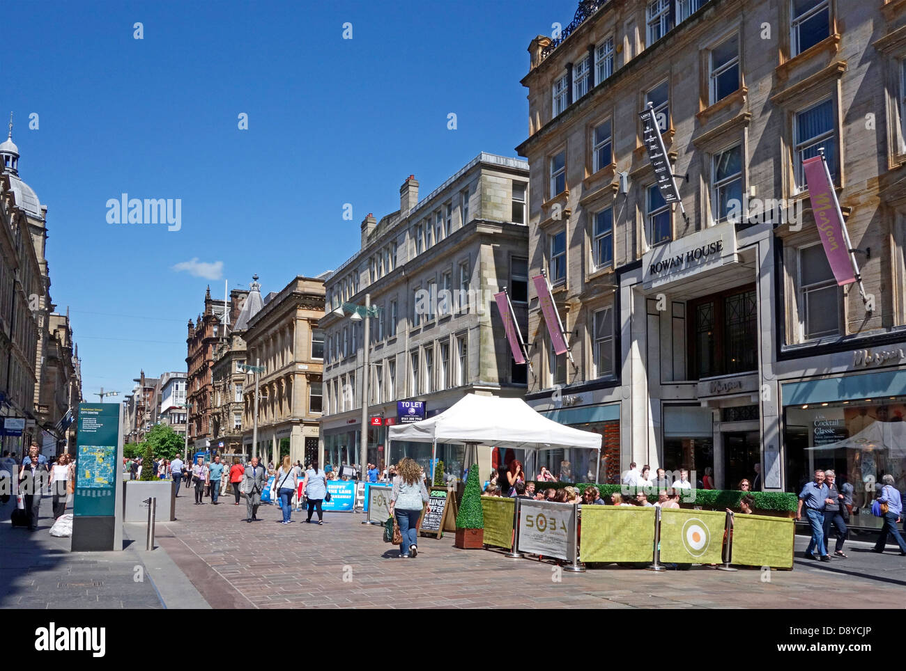Buchanan Street in Glasgow Scotland on a busy day with shoppers and ...