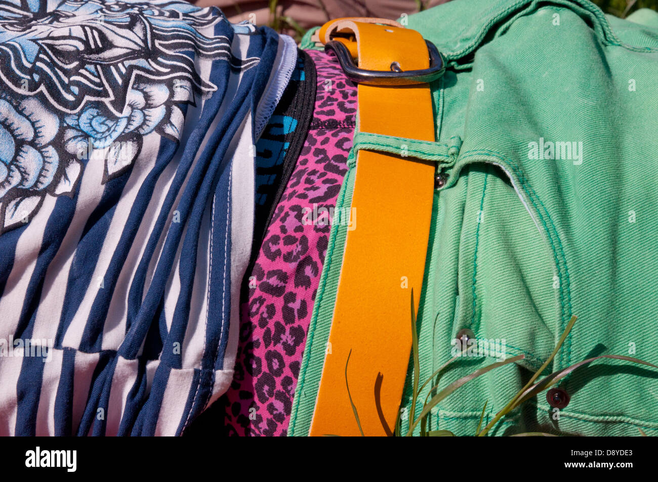 Close up of person wearing colourful layers of clothing Stock Photo - Alamy