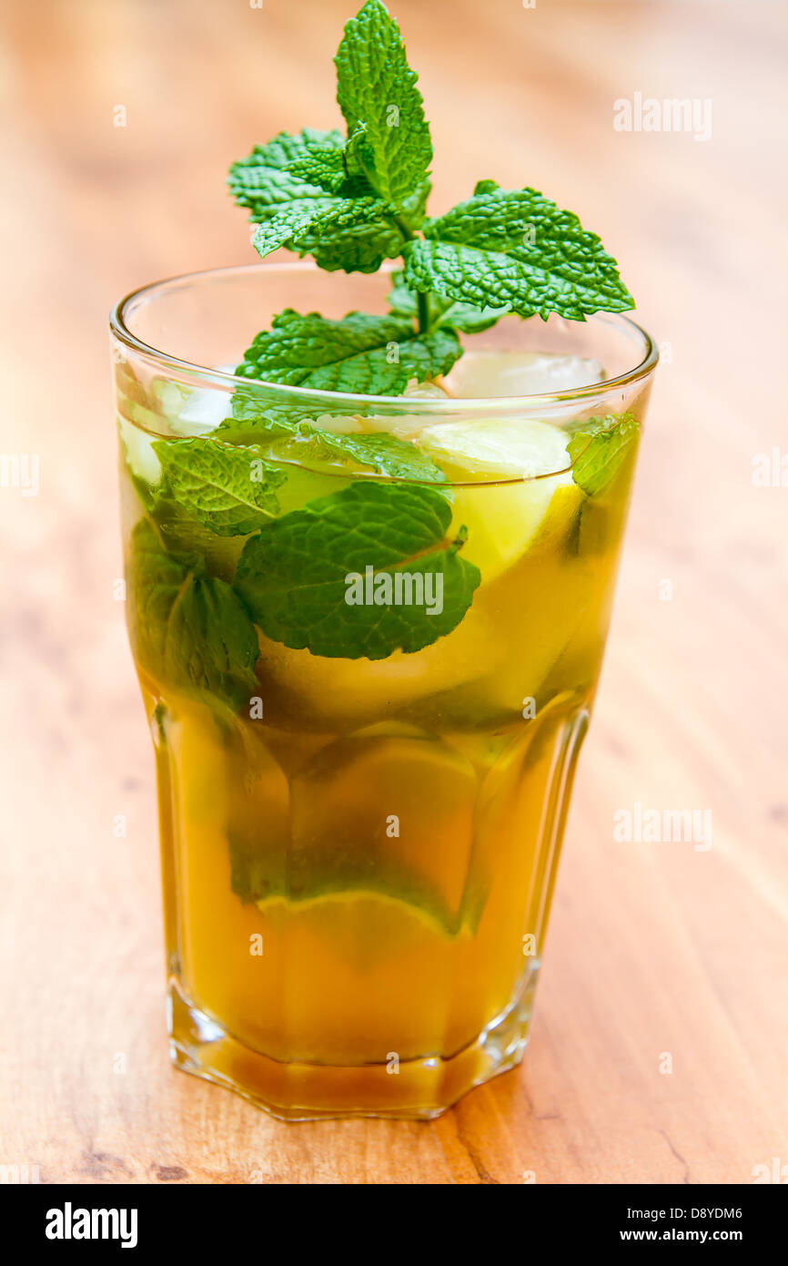 Mojito drink with limes and mint Stock Photo - Alamy