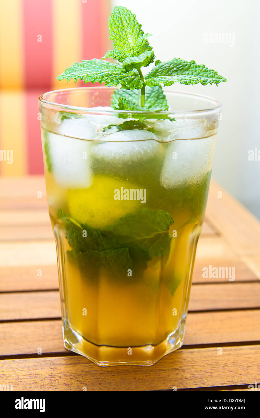 Mojito drink with limes and mint Stock Photo - Alamy