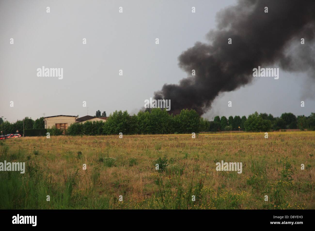 toxic black cloud of a fire at a chemical factory Stock Photo - Alamy