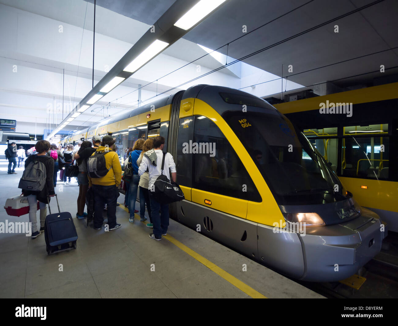 Train arriving at metro station platform in Porto, Portugal Stock Photo ...