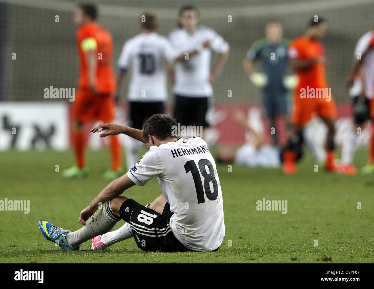 Patrick Herrmann of Germany sits on the pitch after the UEFA European ...