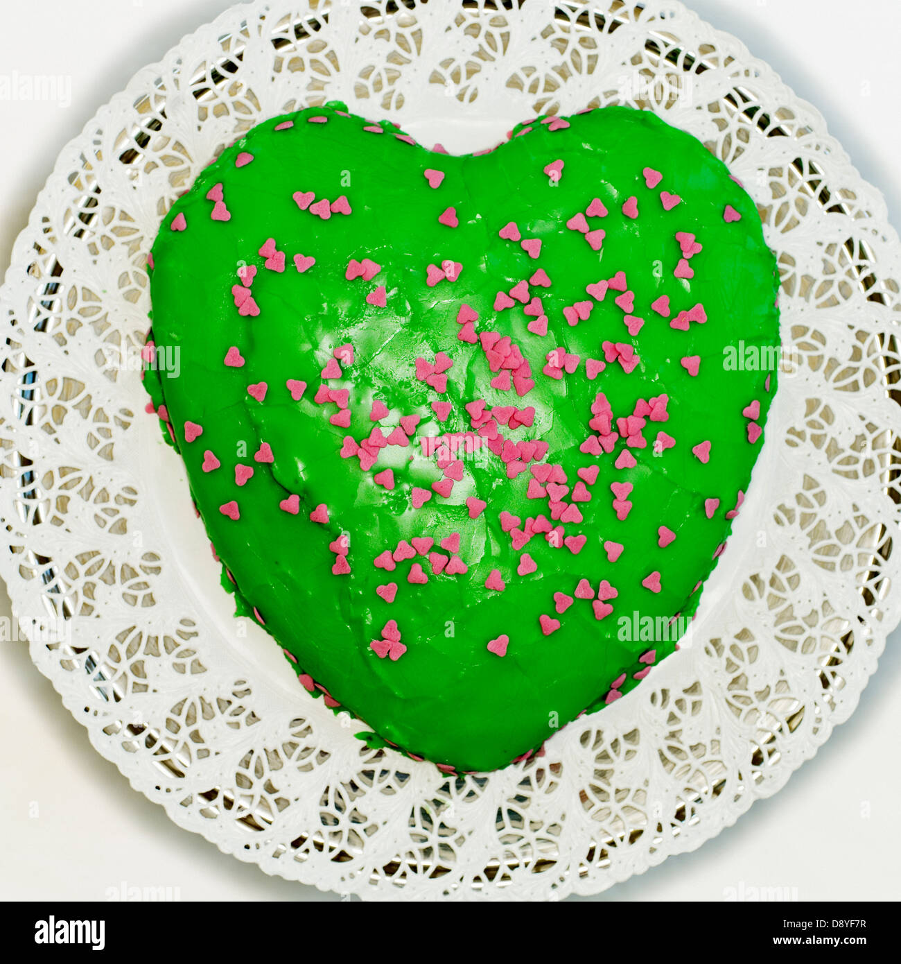 A green cake shaped as a heart Stock Photo - Alamy