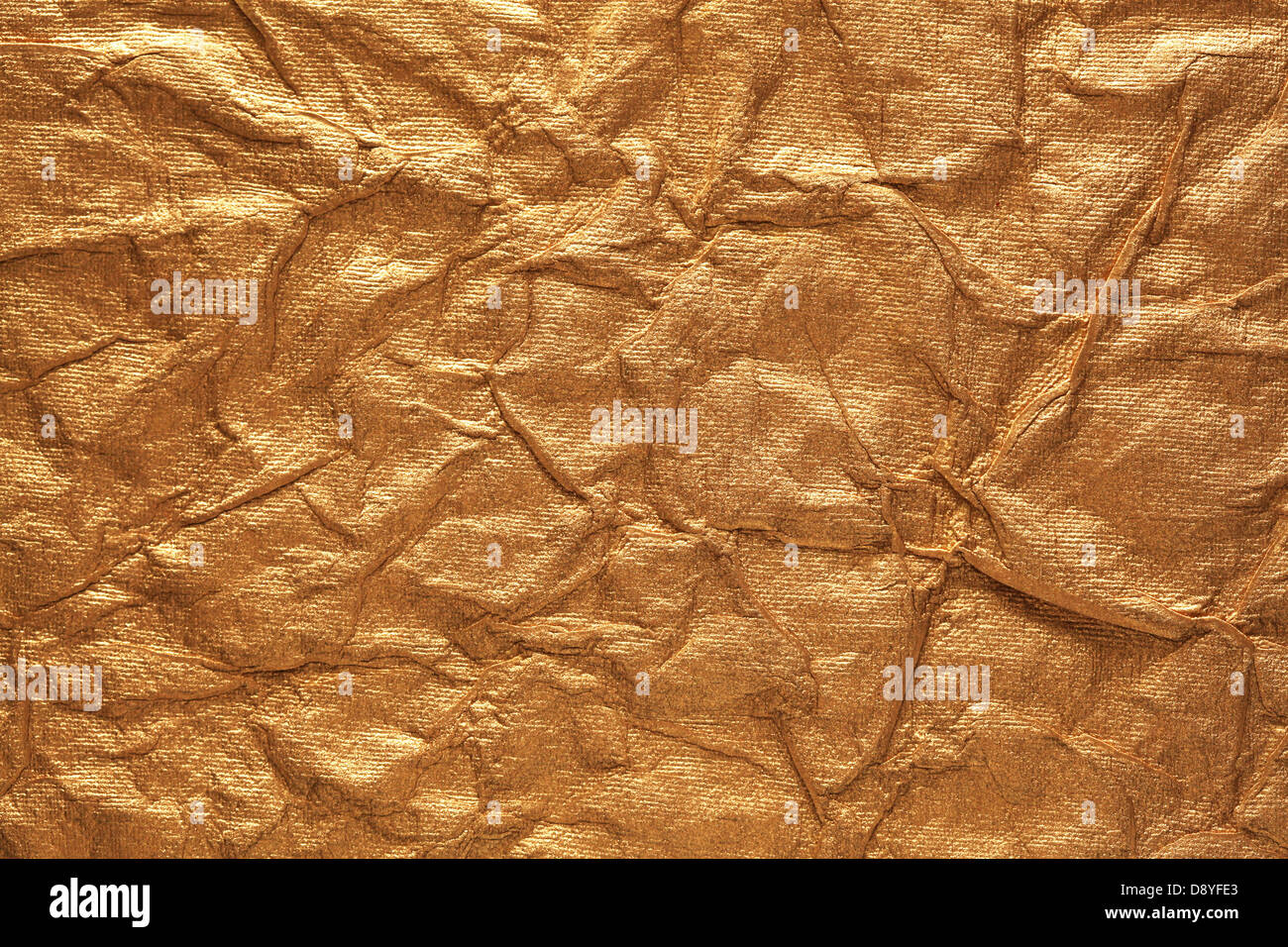 Crumpled gold paper Stock Photo - Alamy
