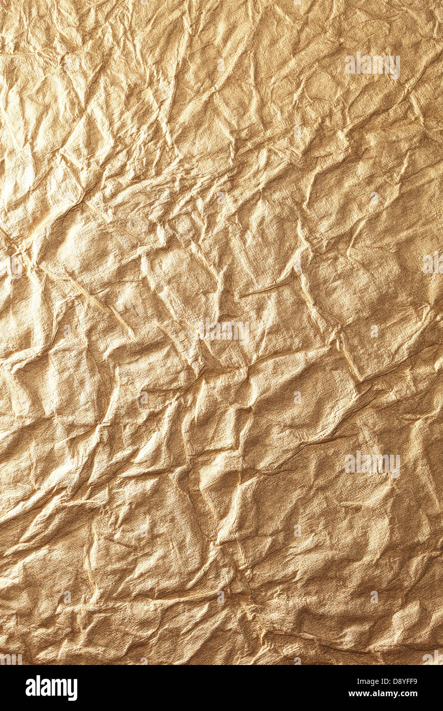 Crumpled gold paper Stock Photo - Alamy