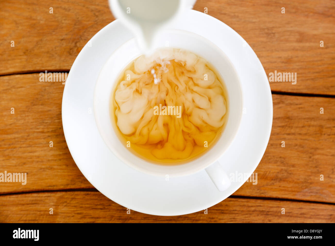 Tea milk teapot hi-res stock photography and images - Alamy