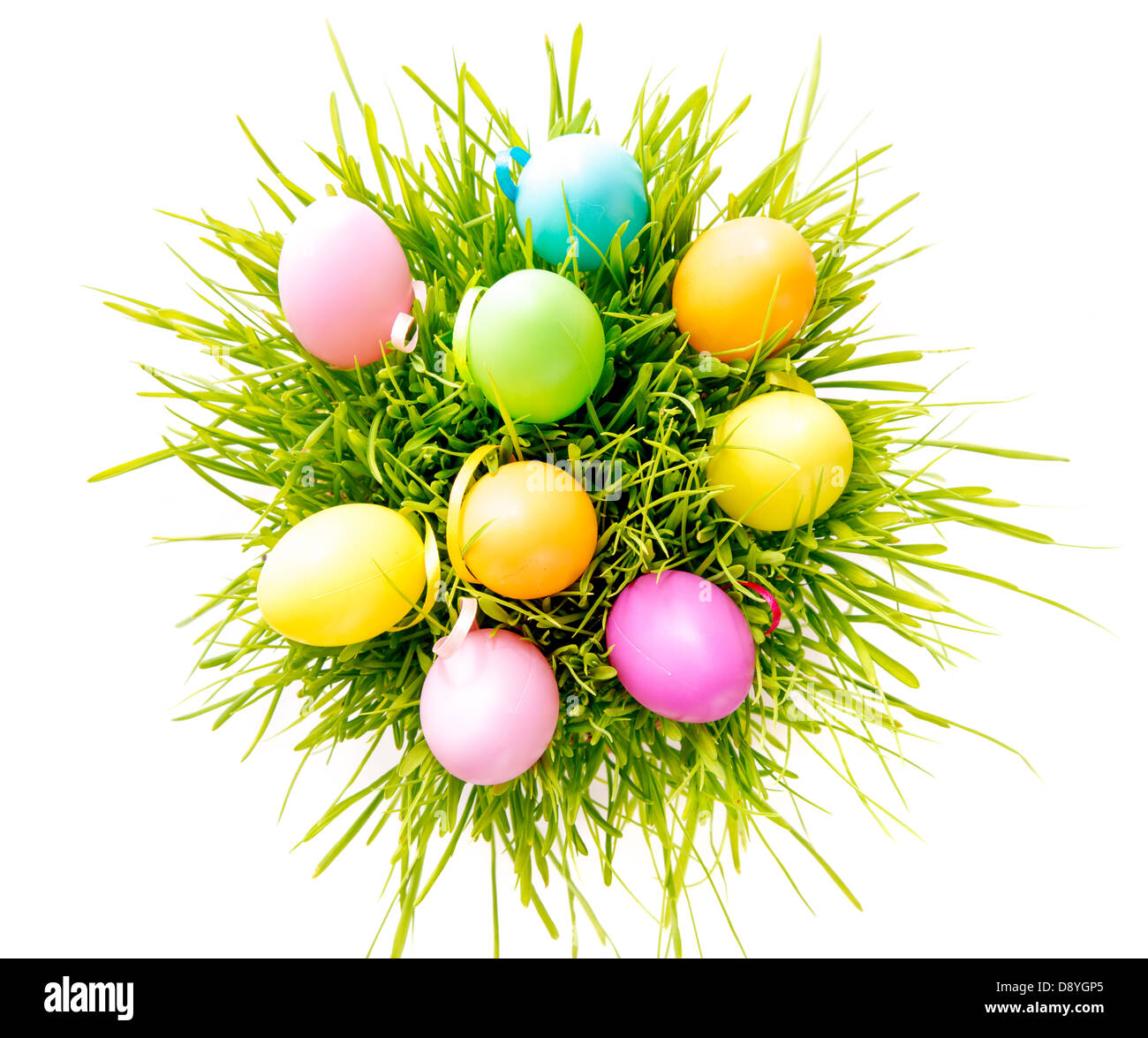 Easter eggs in grass isolated on white background Stock Photo - Alamy